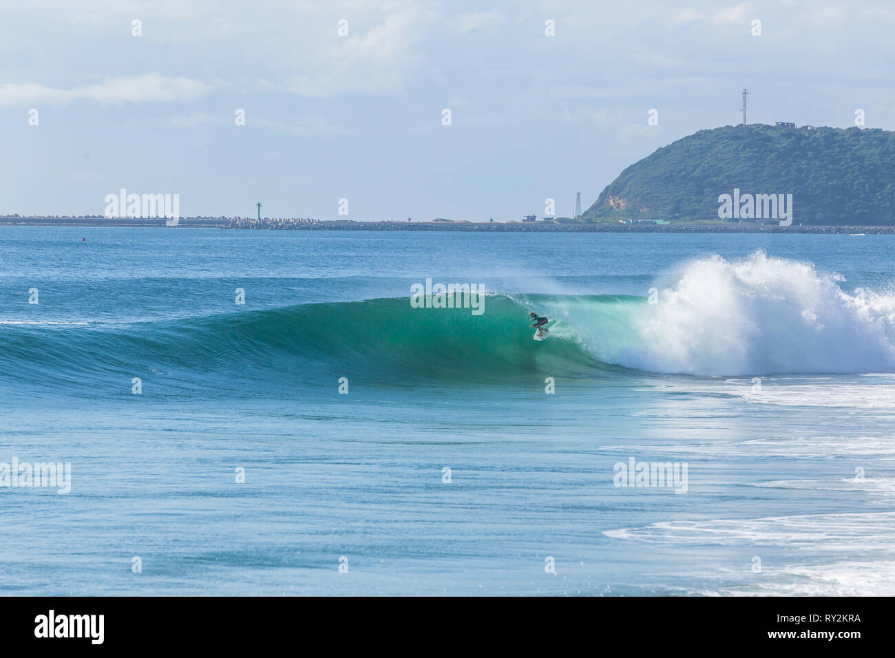 Surfer surfing tube ride turns hollow ocean wave a sporting lifestyle ...