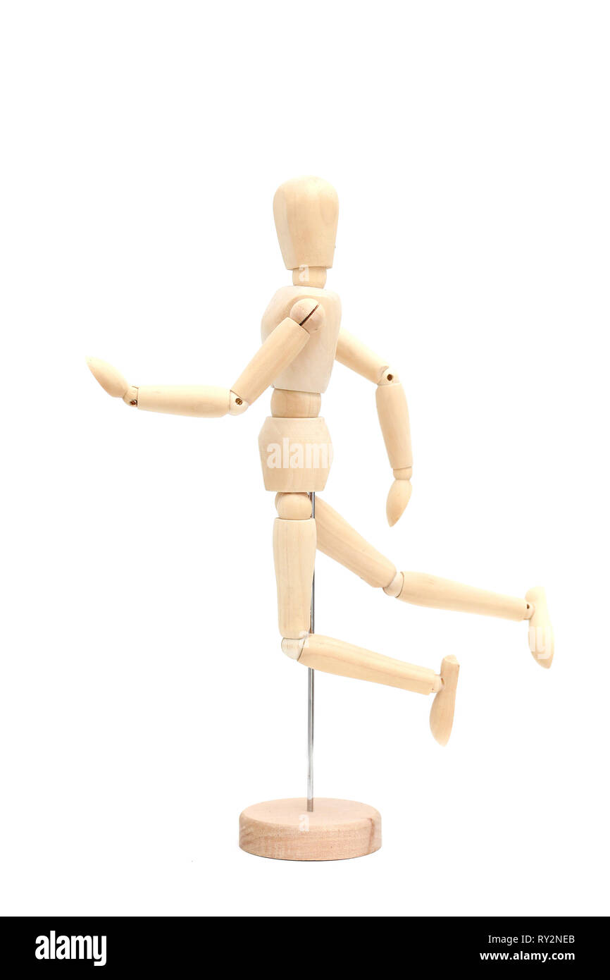 wooden doll in different poses Stock Photo - Alamy