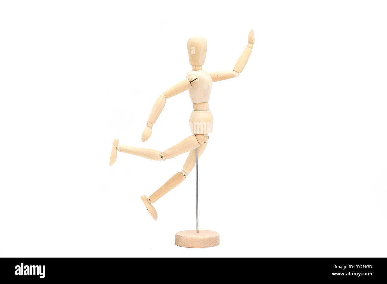 wooden doll in different poses Stock Photo - Alamy