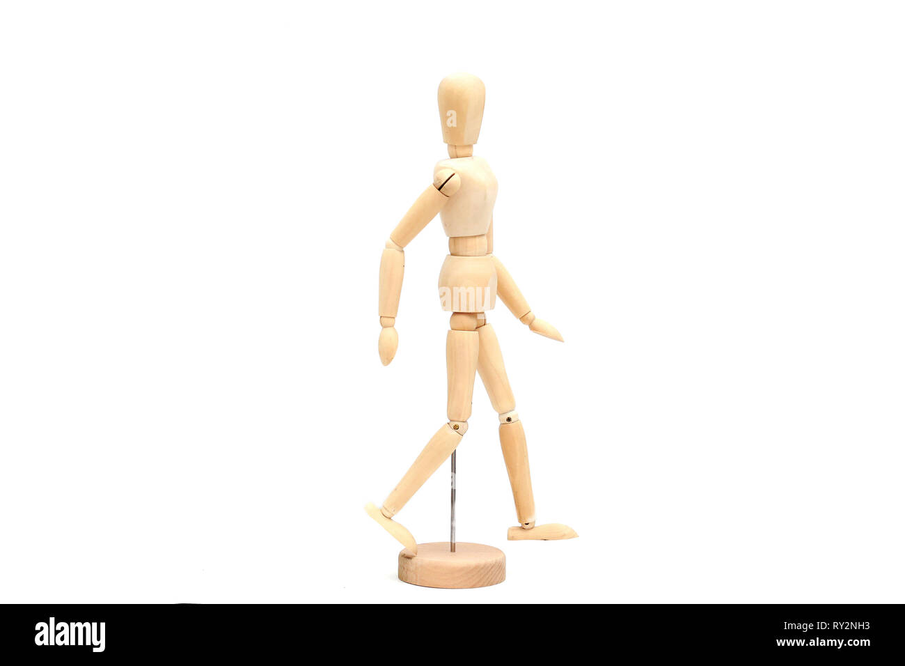 wooden doll in different poses Stock Photo - Alamy