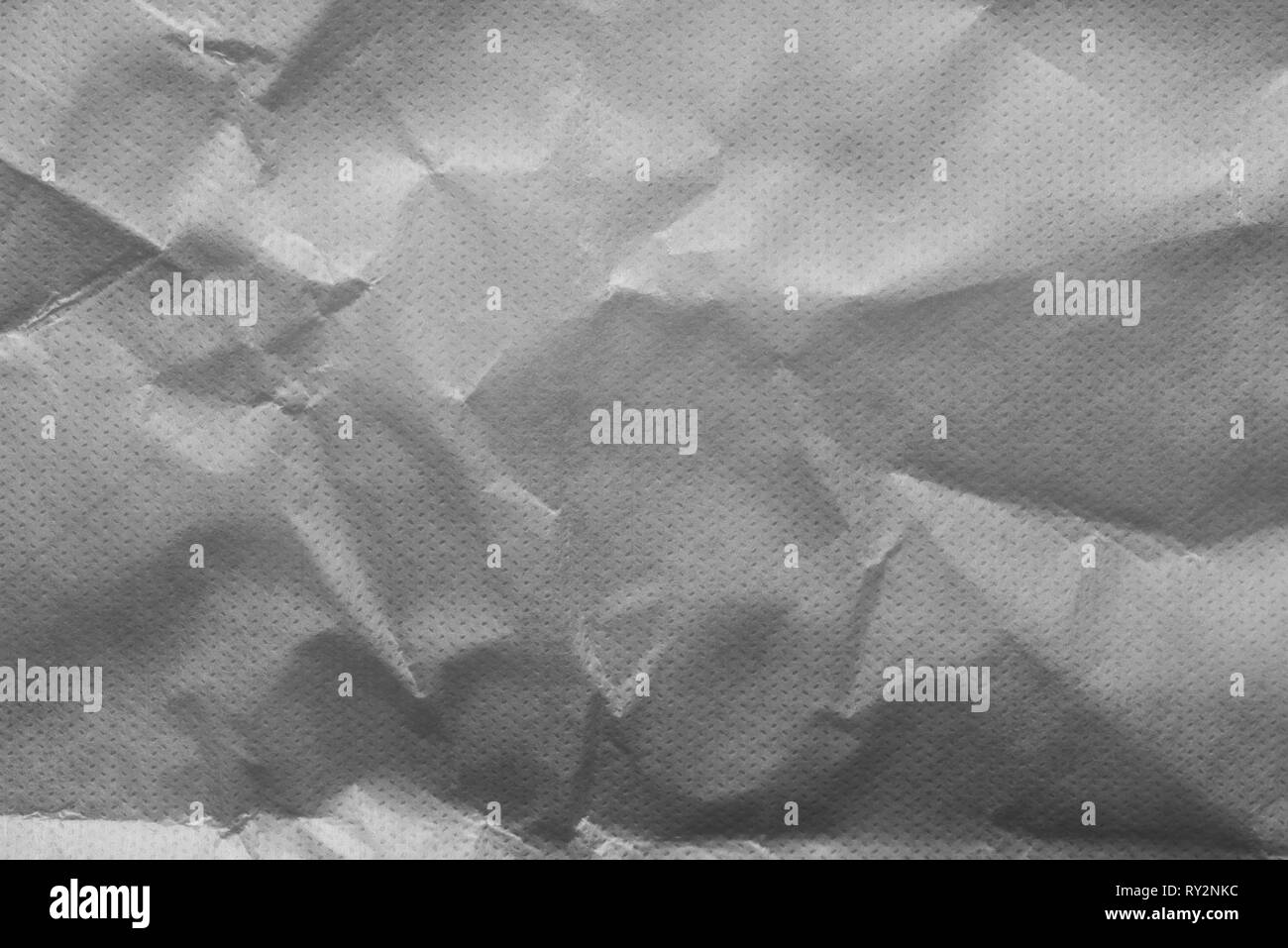 grey creased wrapping paper background texture closeup Stock Photo - Alamy
