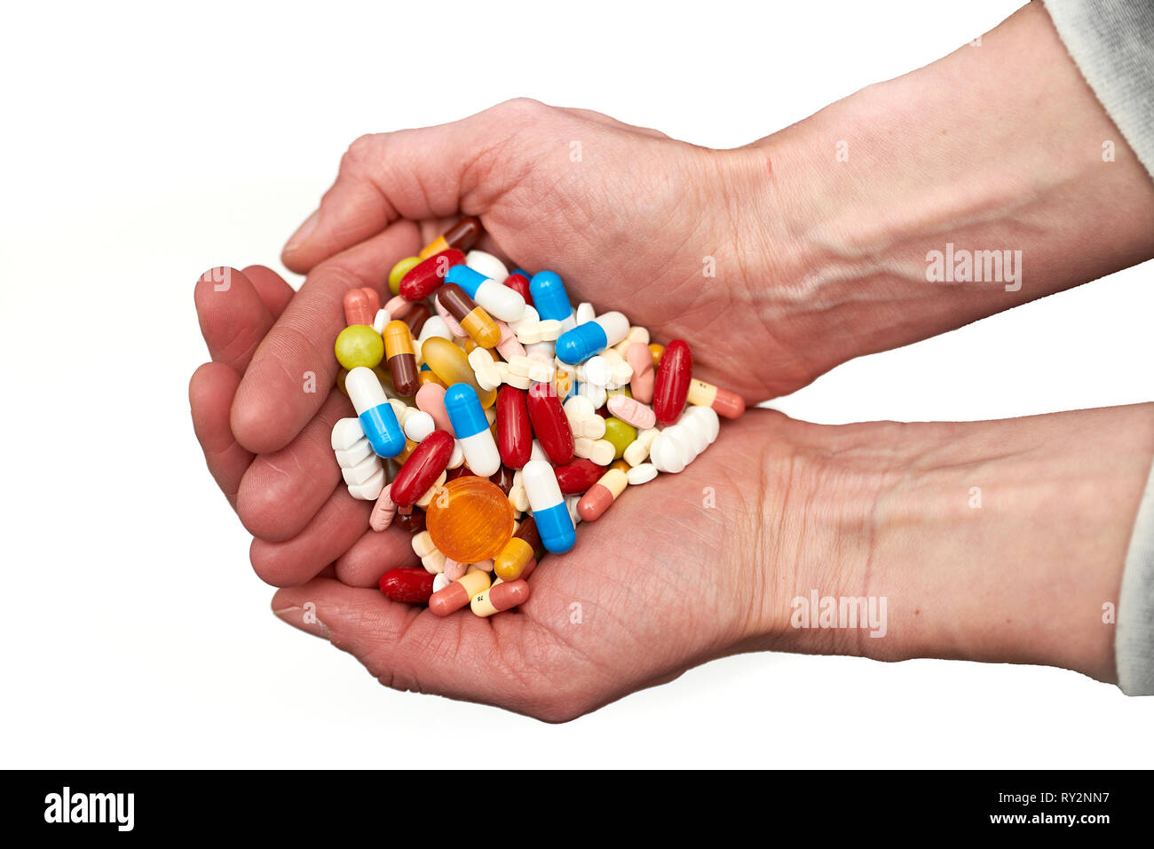 Hands full pills hi-res stock photography and images - Alamy