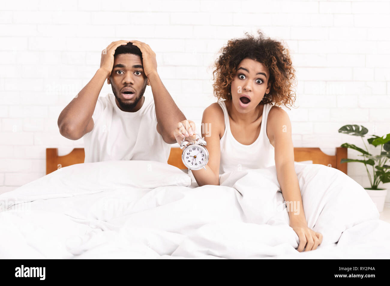 Couple Bed Alarm Clock High Resolution Stock Photography and Images - Alamy
