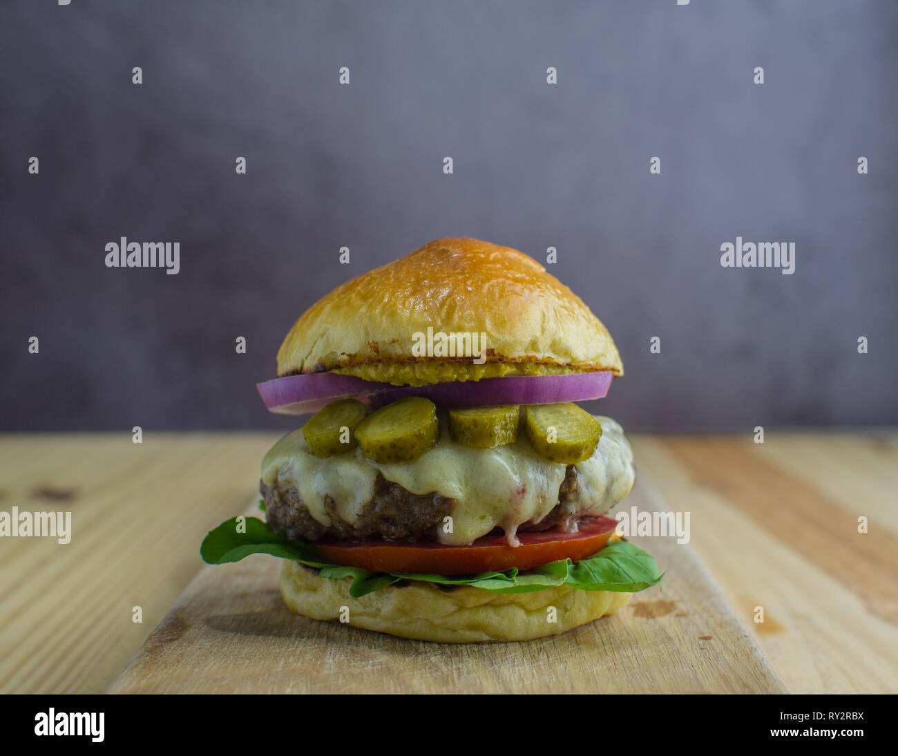 Juicy burger hand hi-res stock photography and images - Alamy