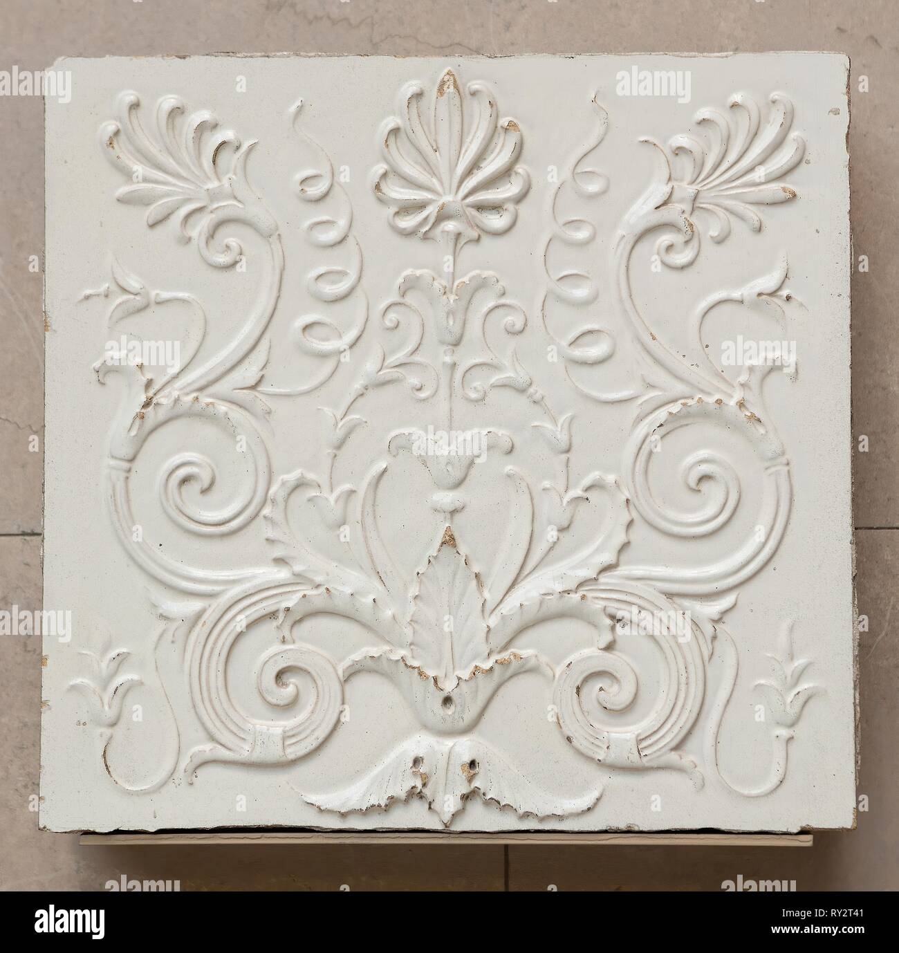 White glazed terra cotta block with foliate design hi-res stock ...