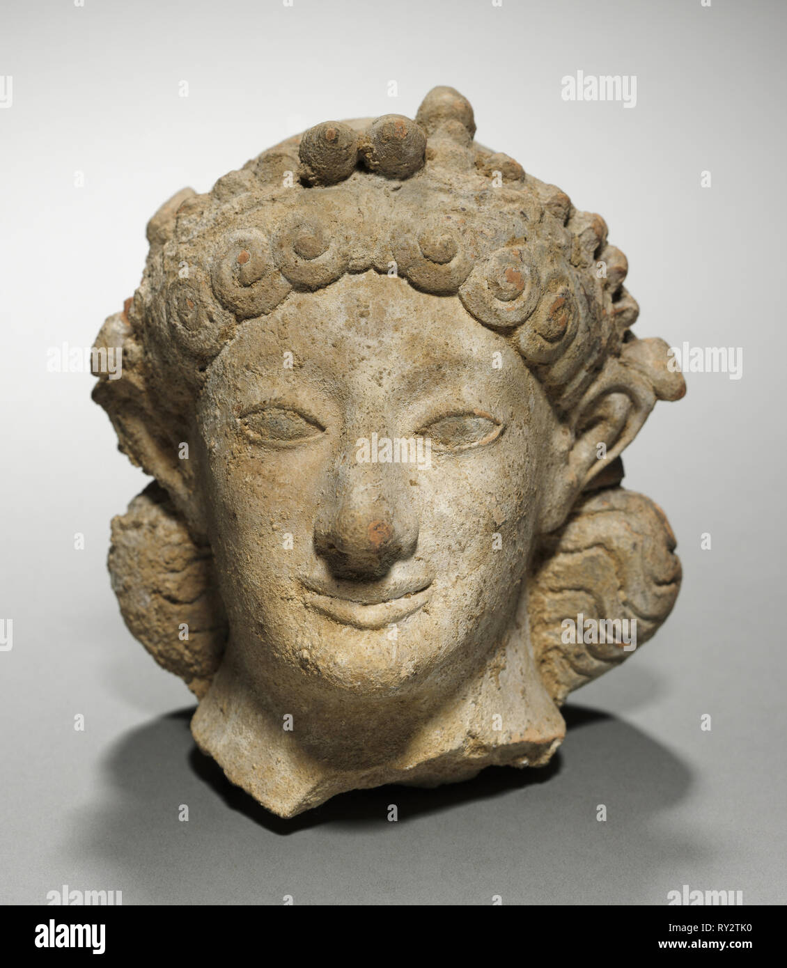 Head of Artemis, 600-575 BC. Greece, late 6th Century BC. Terracotta ...