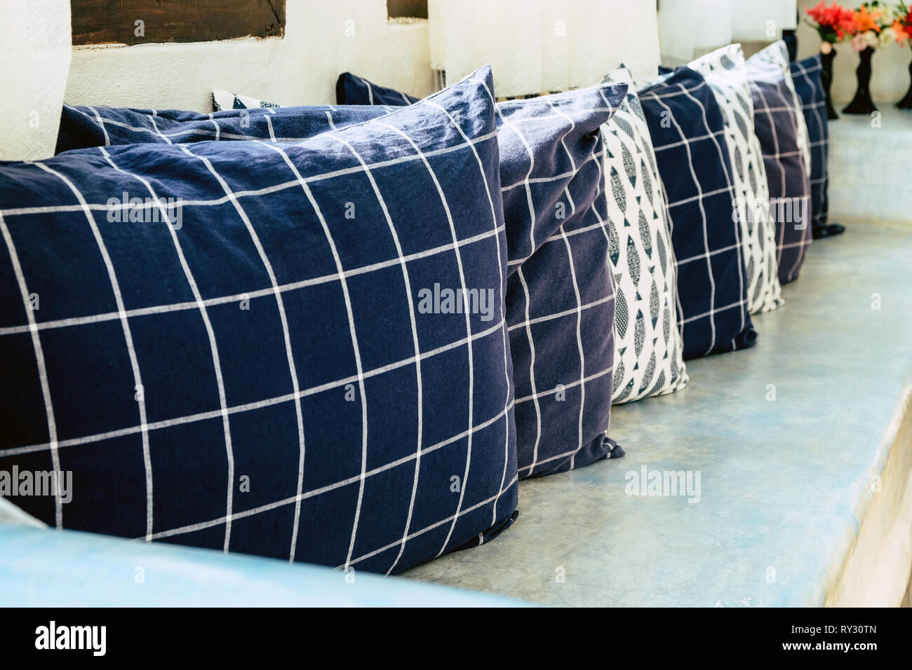 Image of blue pattern pillows in living room Stock Photo - Alamy
