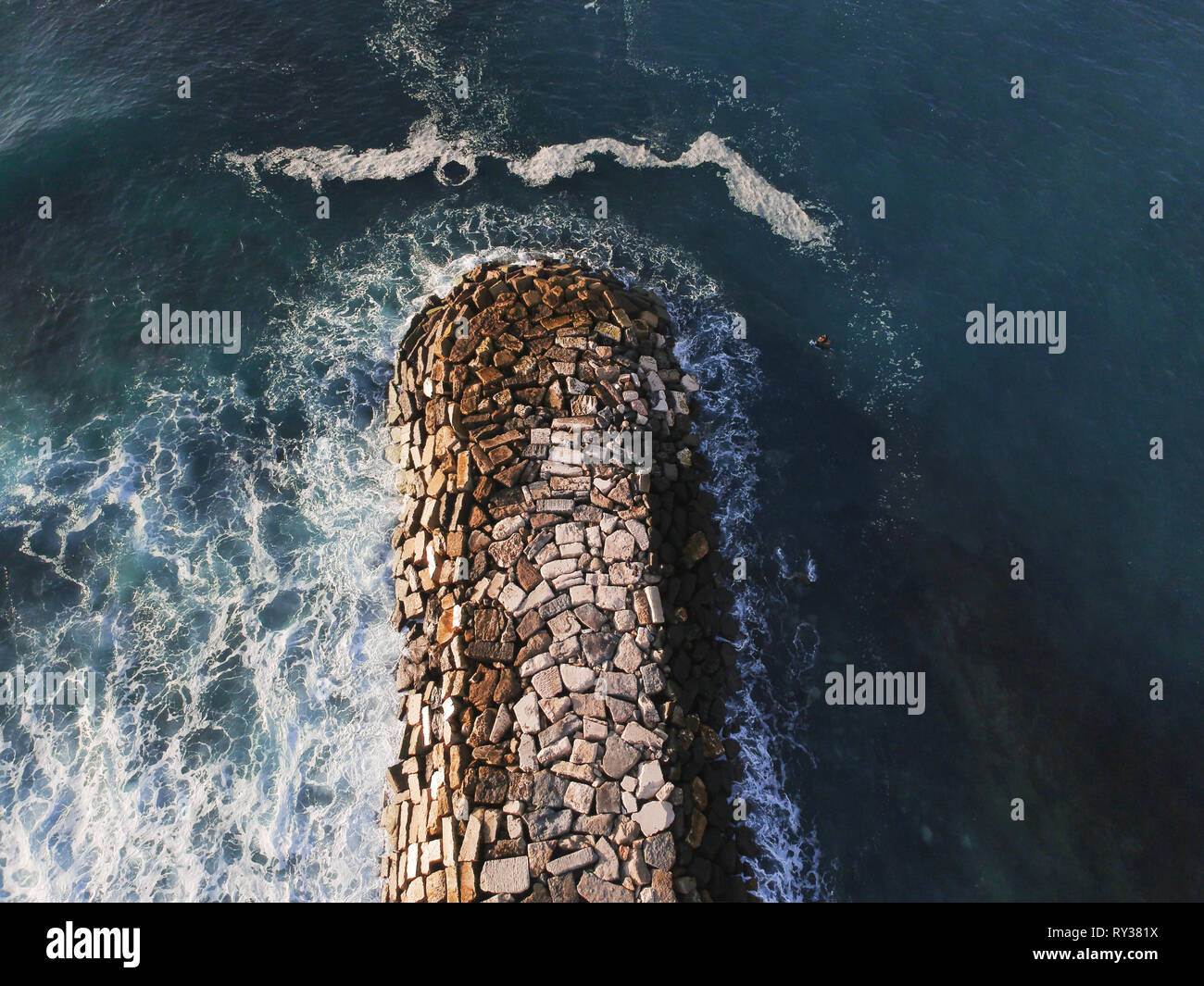 Aerial top view from a stone Jetty. Drone photo Stock Photo - Alamy
