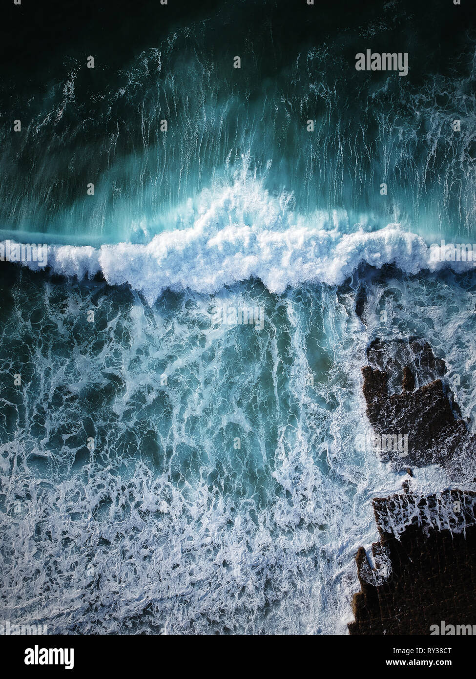 Aerial top view of ocean wave with foam. Drone Photo Stock Photo - Alamy
