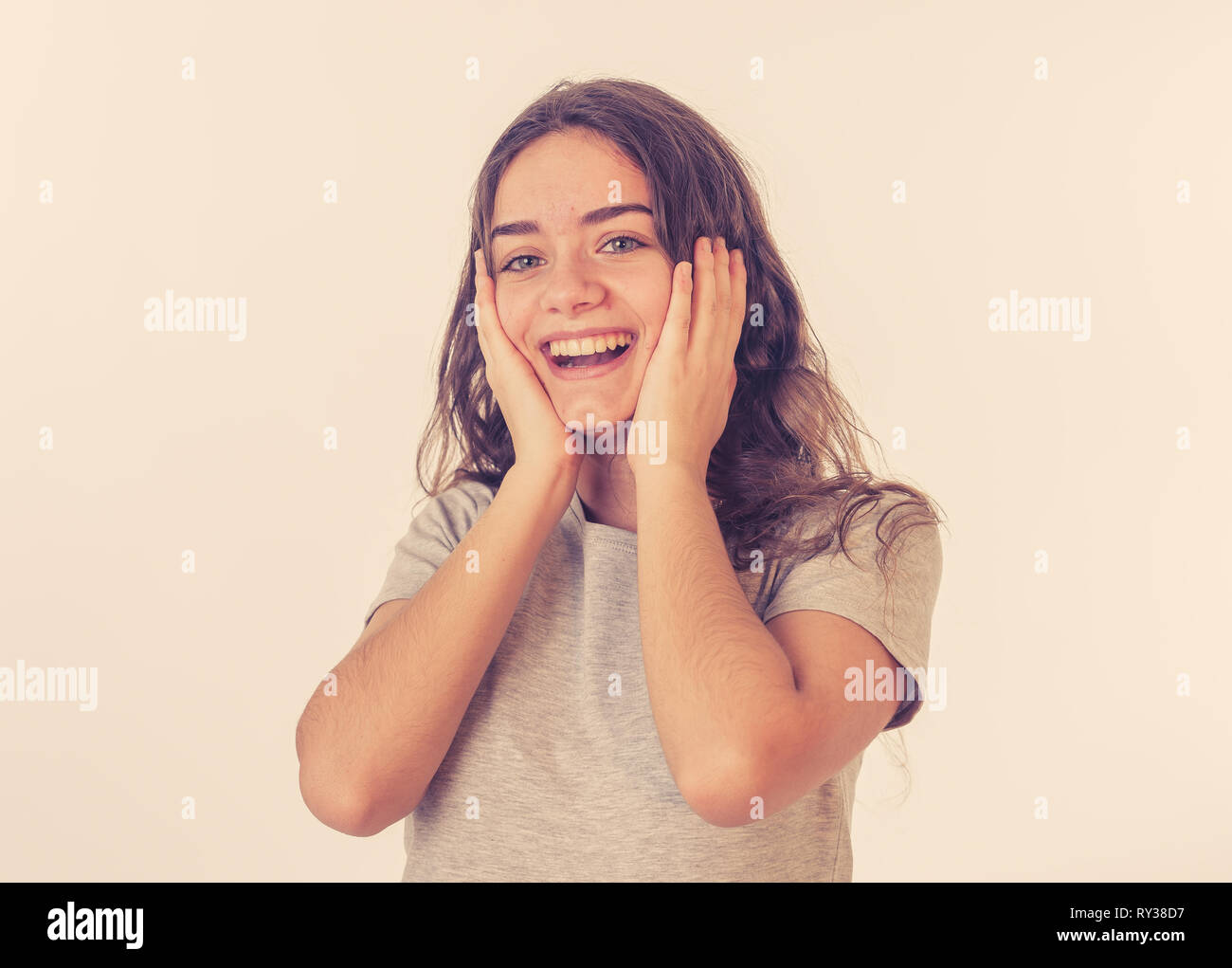 Portrait of beautiful shocked girl celebrating victory, having great ...