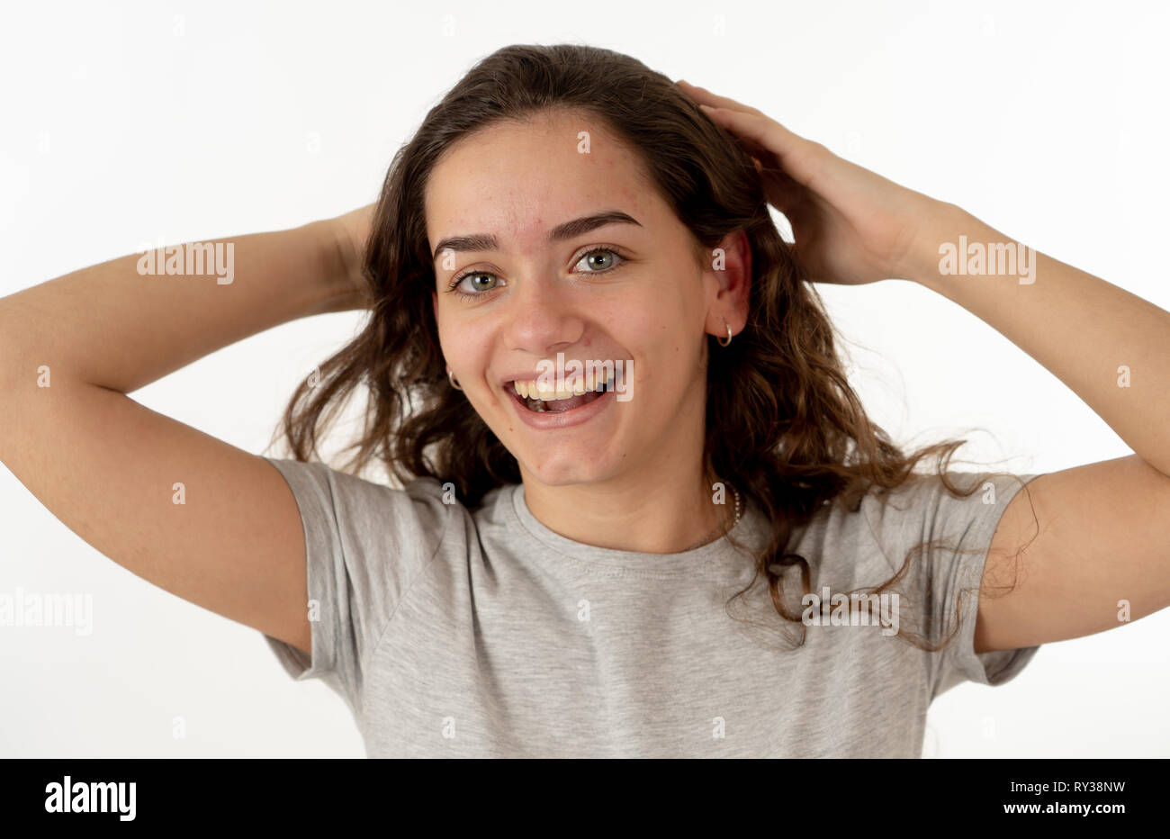 Portrait of beautiful shocked girl celebrating victory, having great ...