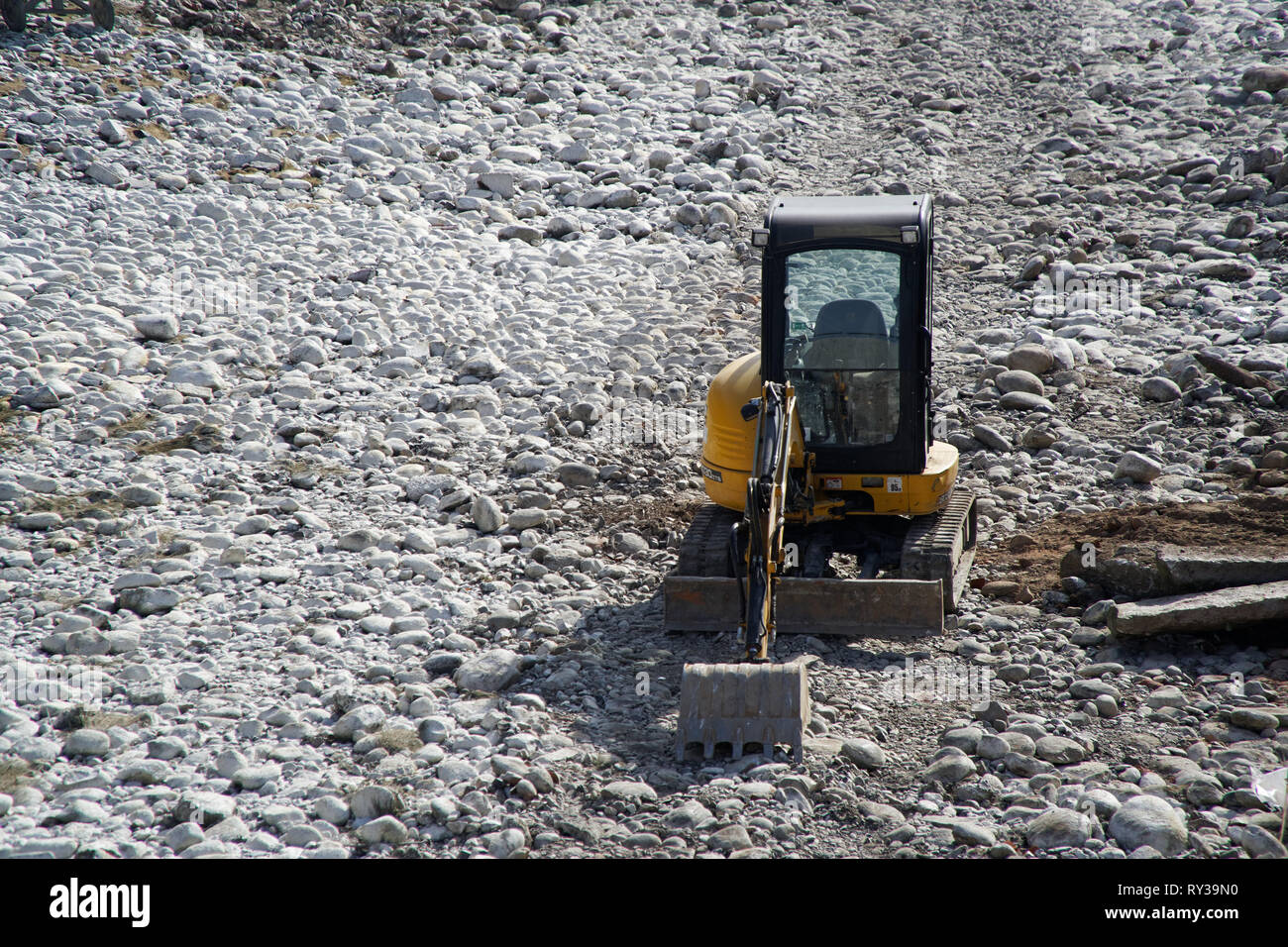Construction Site damaged wall repairing, construction machinery ...