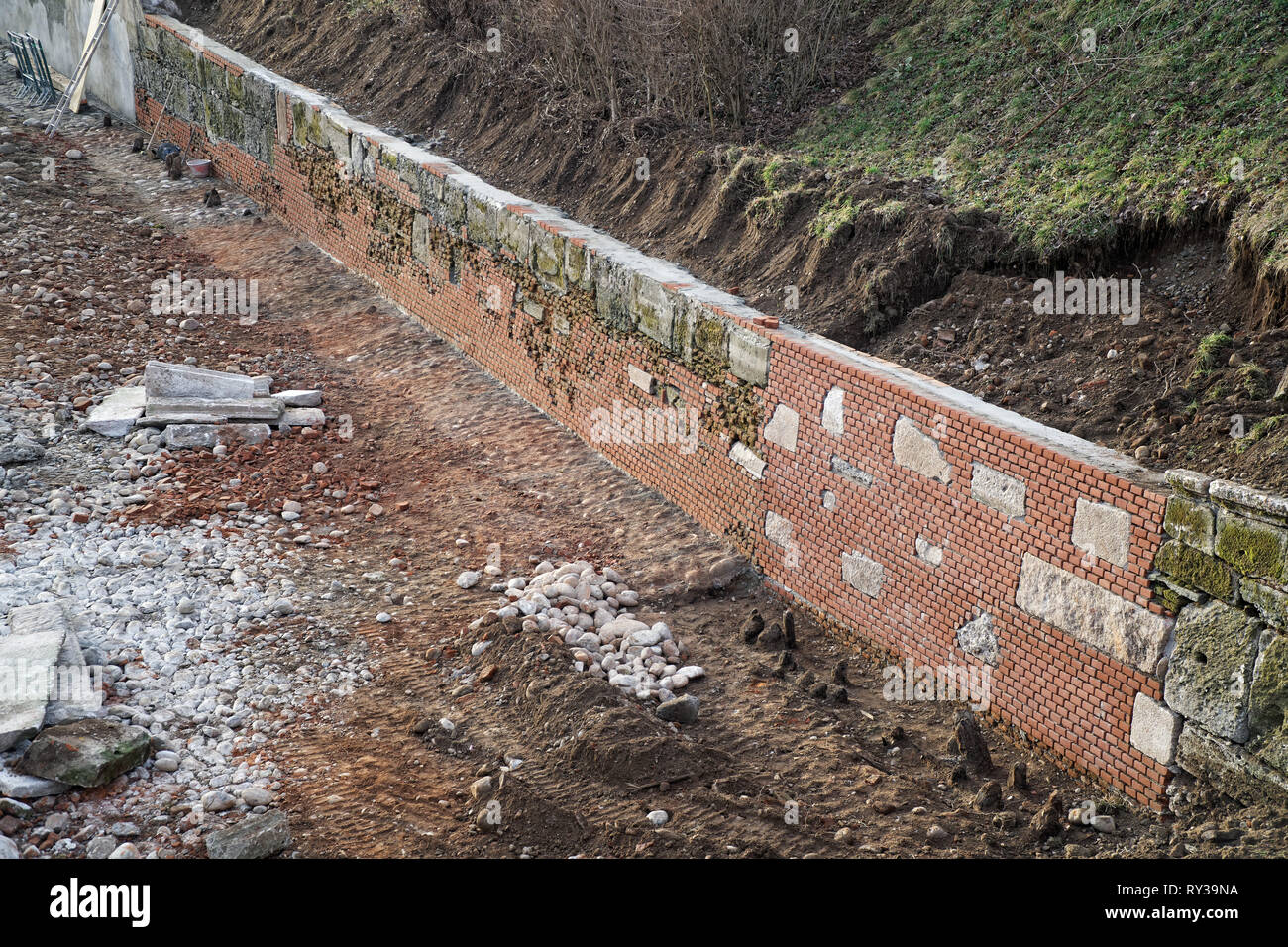 Construction Site damaged wall repairing, construction machinery ...
