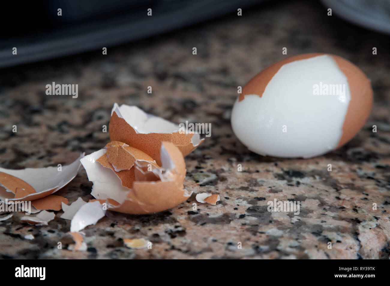 Peeling eggs hi-res stock photography and images - Alamy