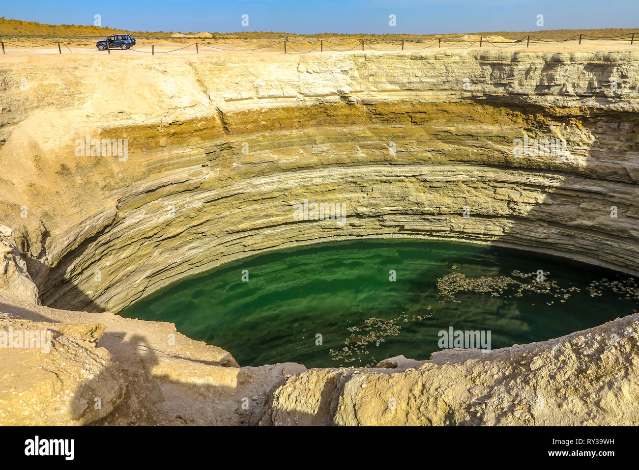 Darvaza Mud Volcano Crater Pit Filled with Water View Stock Photo - Alamy