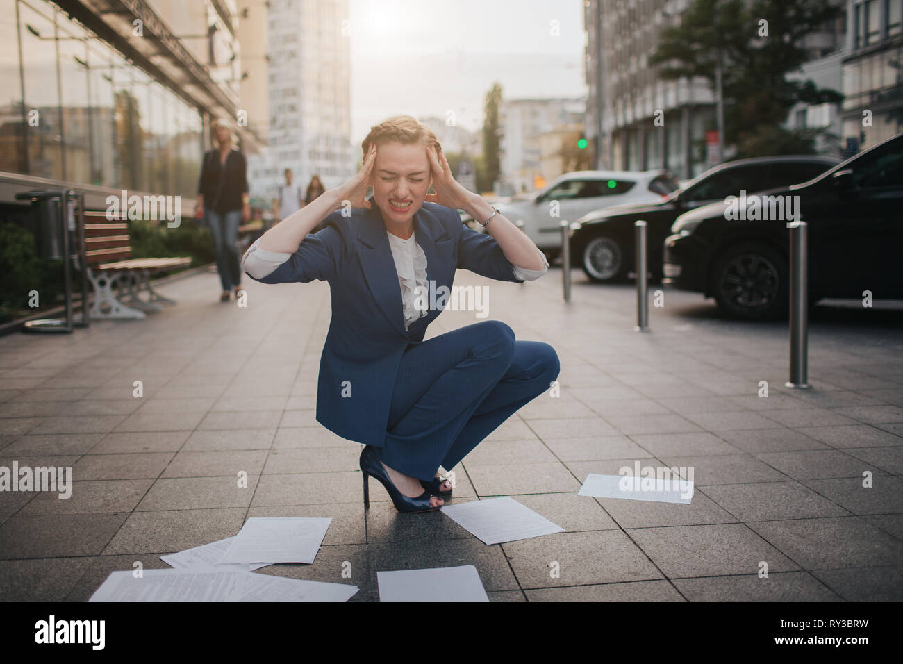 Woman surrounded by paperwork hi-res stock photography and images - Alamy