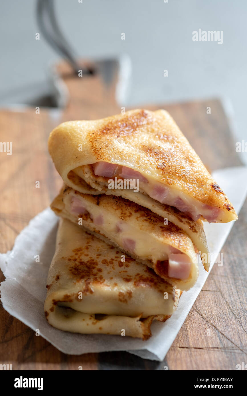Crepes with ham and cheese Stock Photo - Alamy