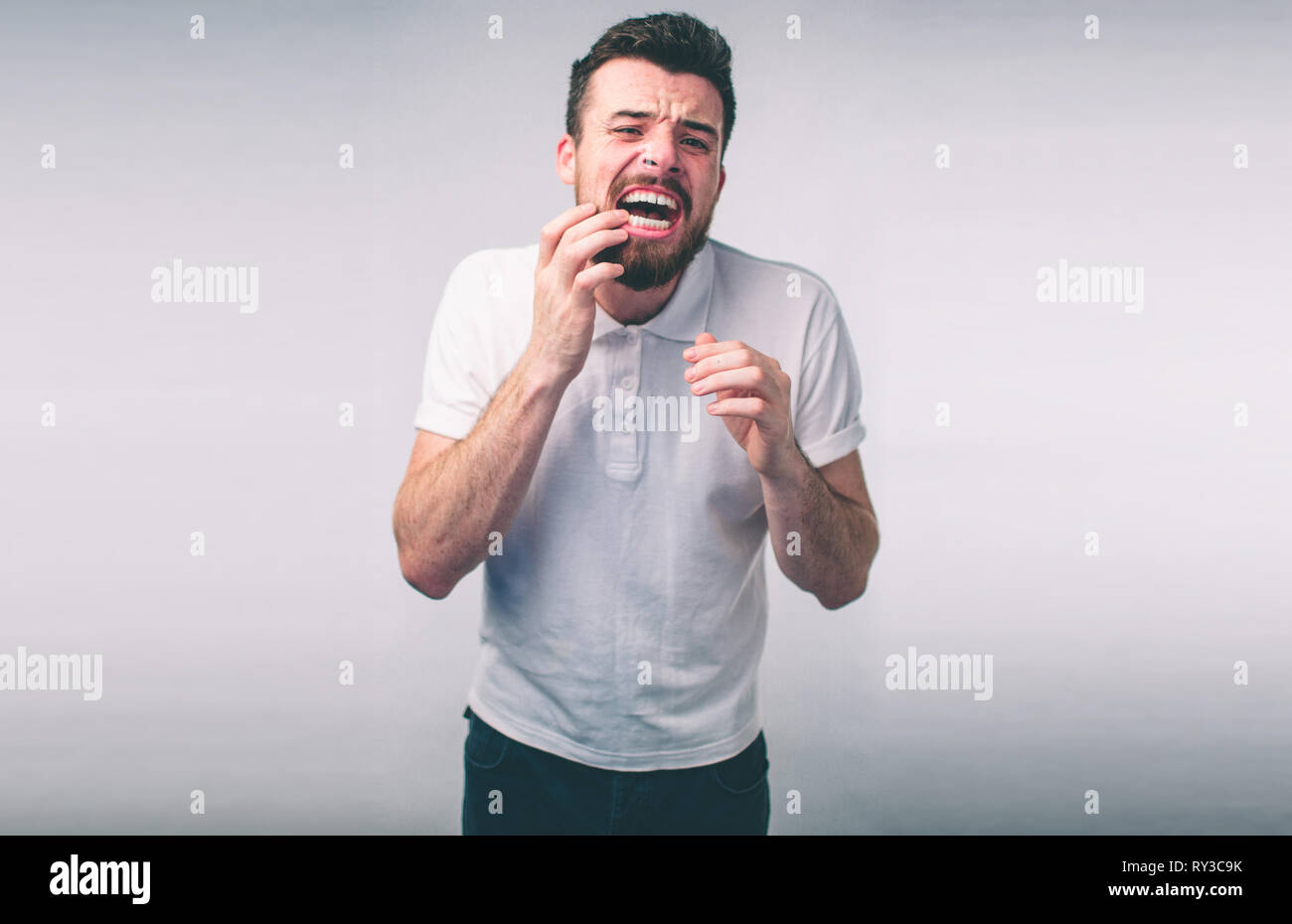 Teeth Problem. Man Feeling Tooth Pain. Closeup Of Bearded boy Suffering ...