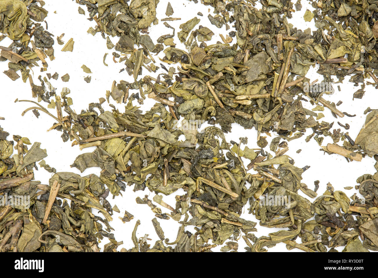 Lot of pieces of dry green tea flatlay isolated on white background ...