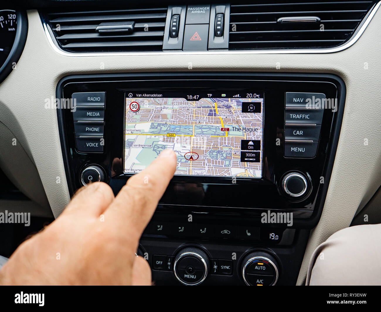 THE HAGUE, NETHERLANDS - AUG 19, 2018: Crop shot of male finger ...