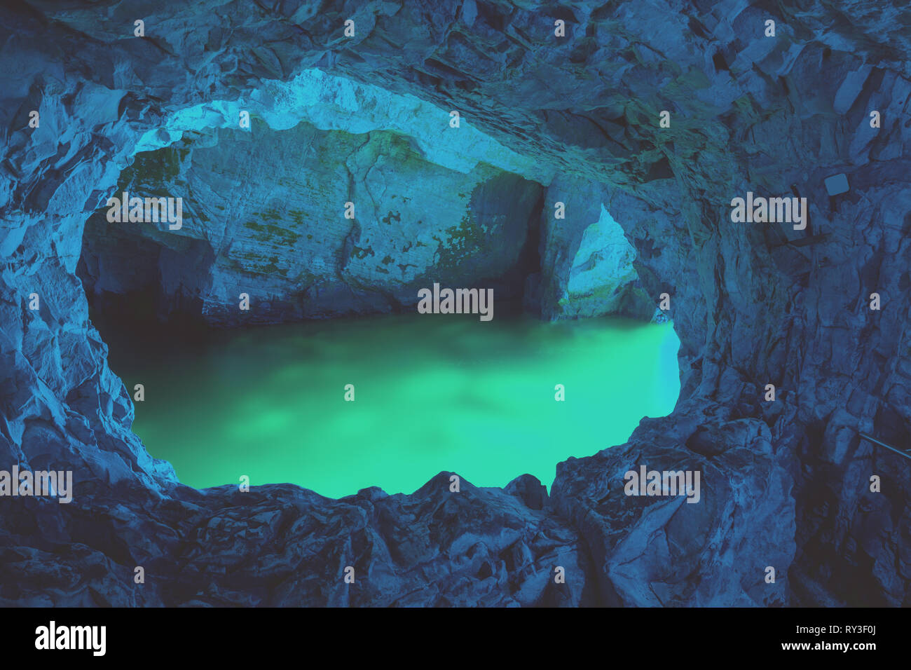 The Rosh HaNikra natural grottoes. Tunnel in the rock. Blue light Stock ...