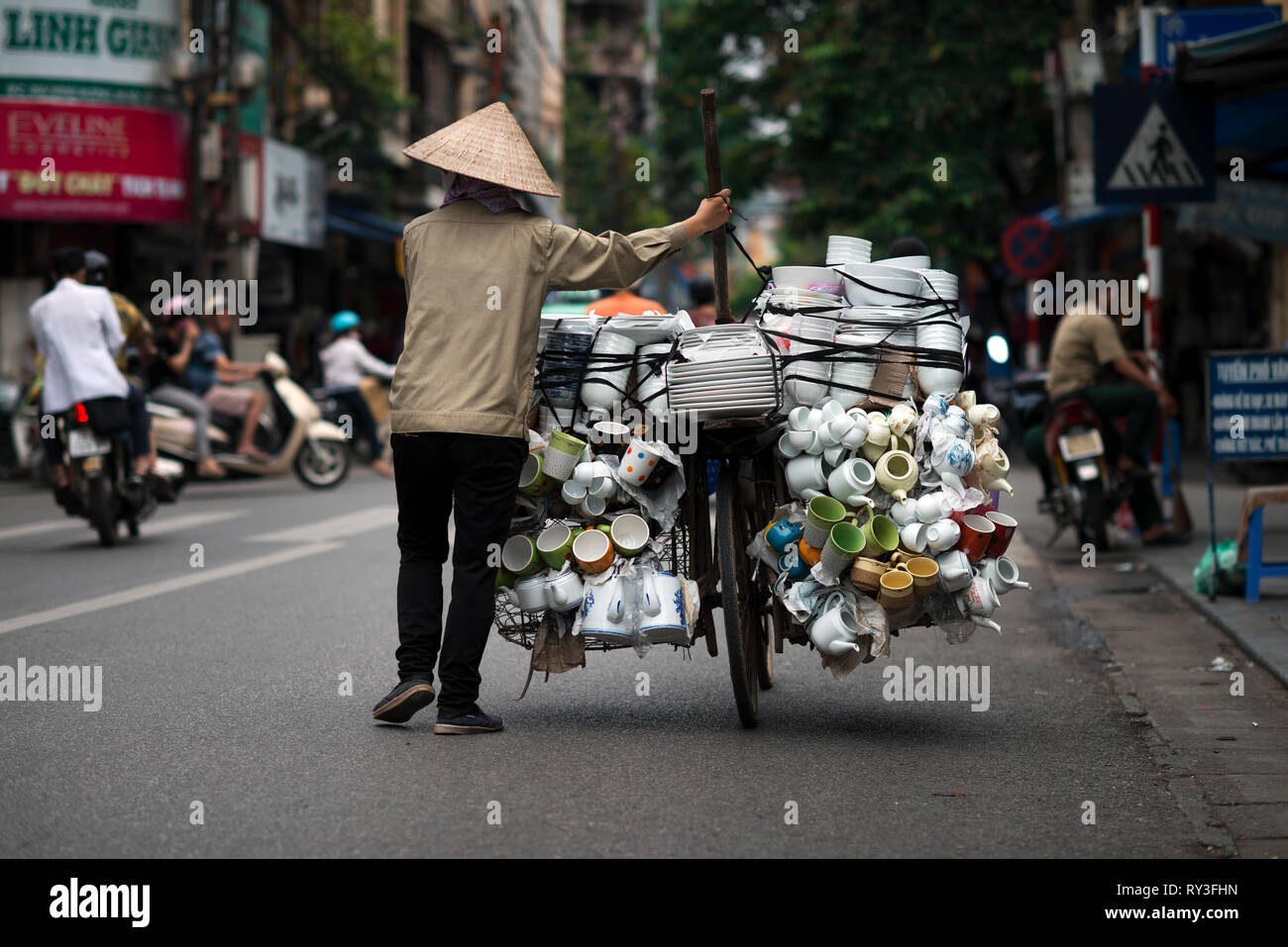 Vendor on bicycle hi-res stock photography and images - Alamy