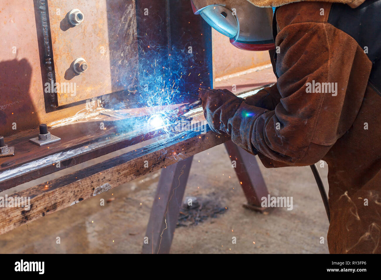 Welding work, welder welding metal material in heavy industry ...