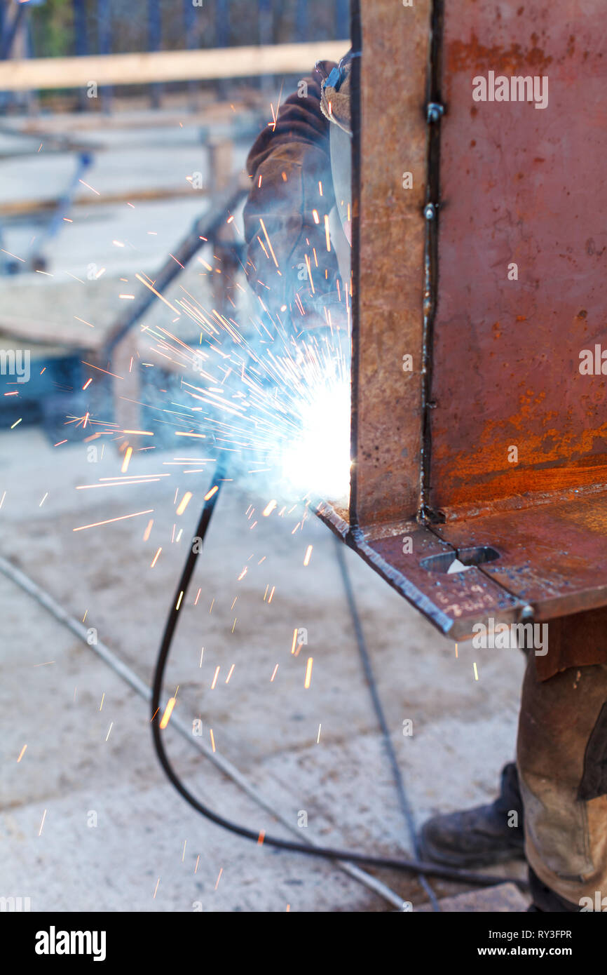 Welding work, welder welding metal material in heavy industry ...
