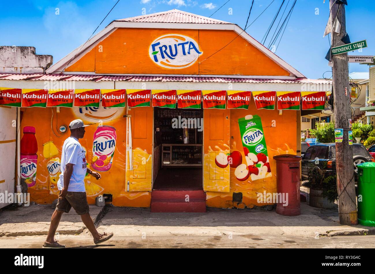 Dominica, Capital Roseau, scene of daily life, food shop with painted ...