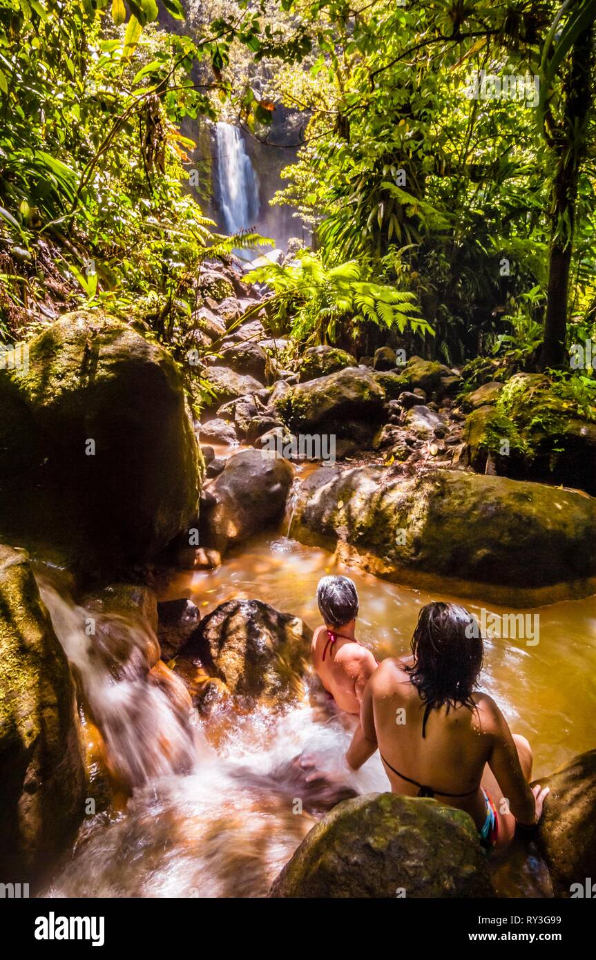 Woman bathing in waterfall hi-res stock photography and images - Alamy