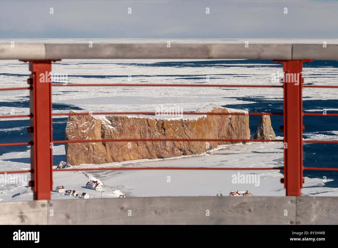 Winter view of the Percé Rock from the Percé UNESCO Global Geopark ...