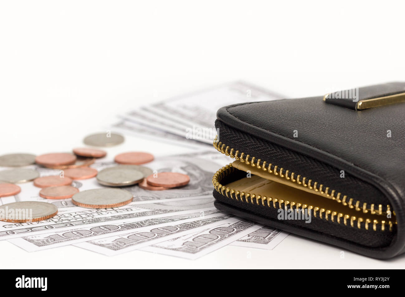 Black leather wallet with banknote and coins on white background Stock ...