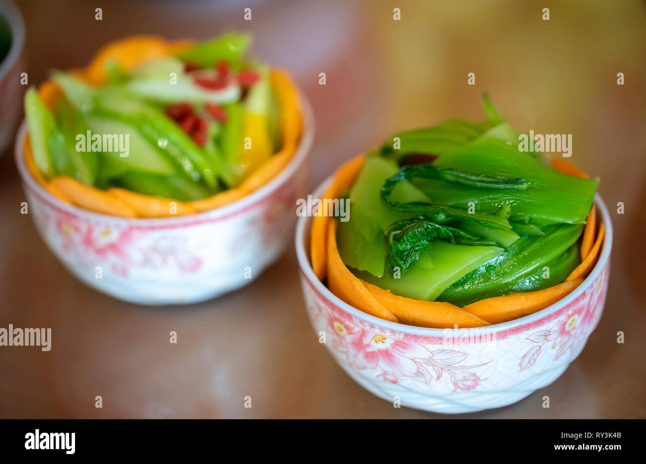 Food offering at a local Buddhist retreat Stock Photo - Alamy
