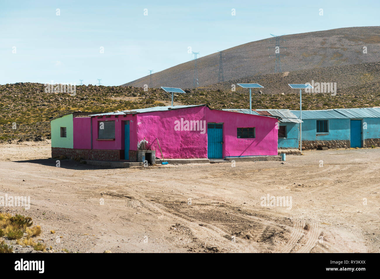 bright colorful painted buildings with solar panels in altitude area of ...