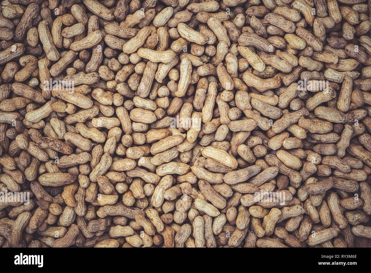 Texture of many peanuts are dried in the sun. Concept of agriculture or ...