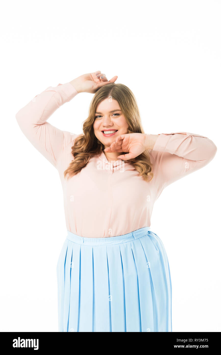 happy smiling elegant overweight woman posing with hands near face ...