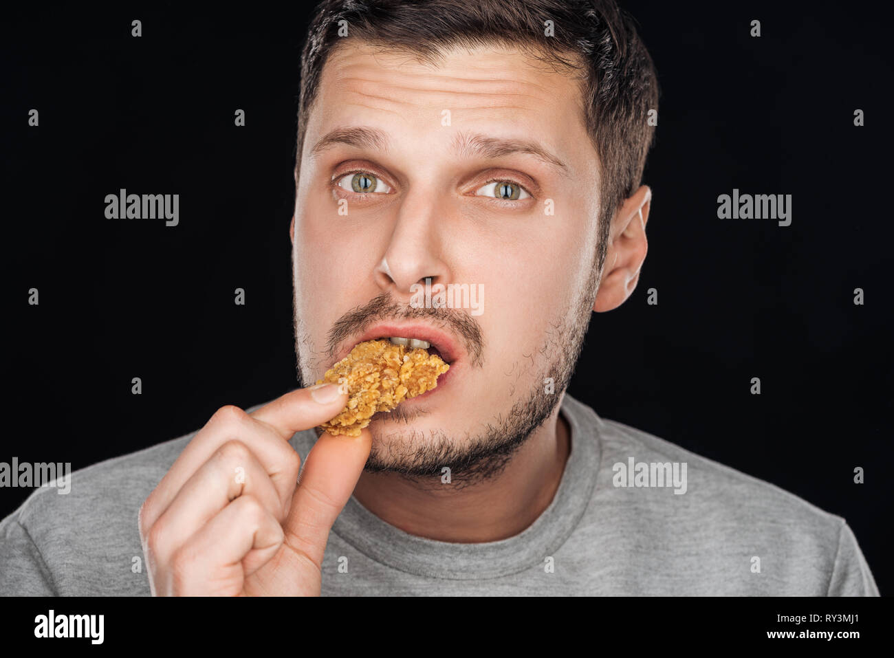 Man eating chicken hi-res stock photography and images - Alamy