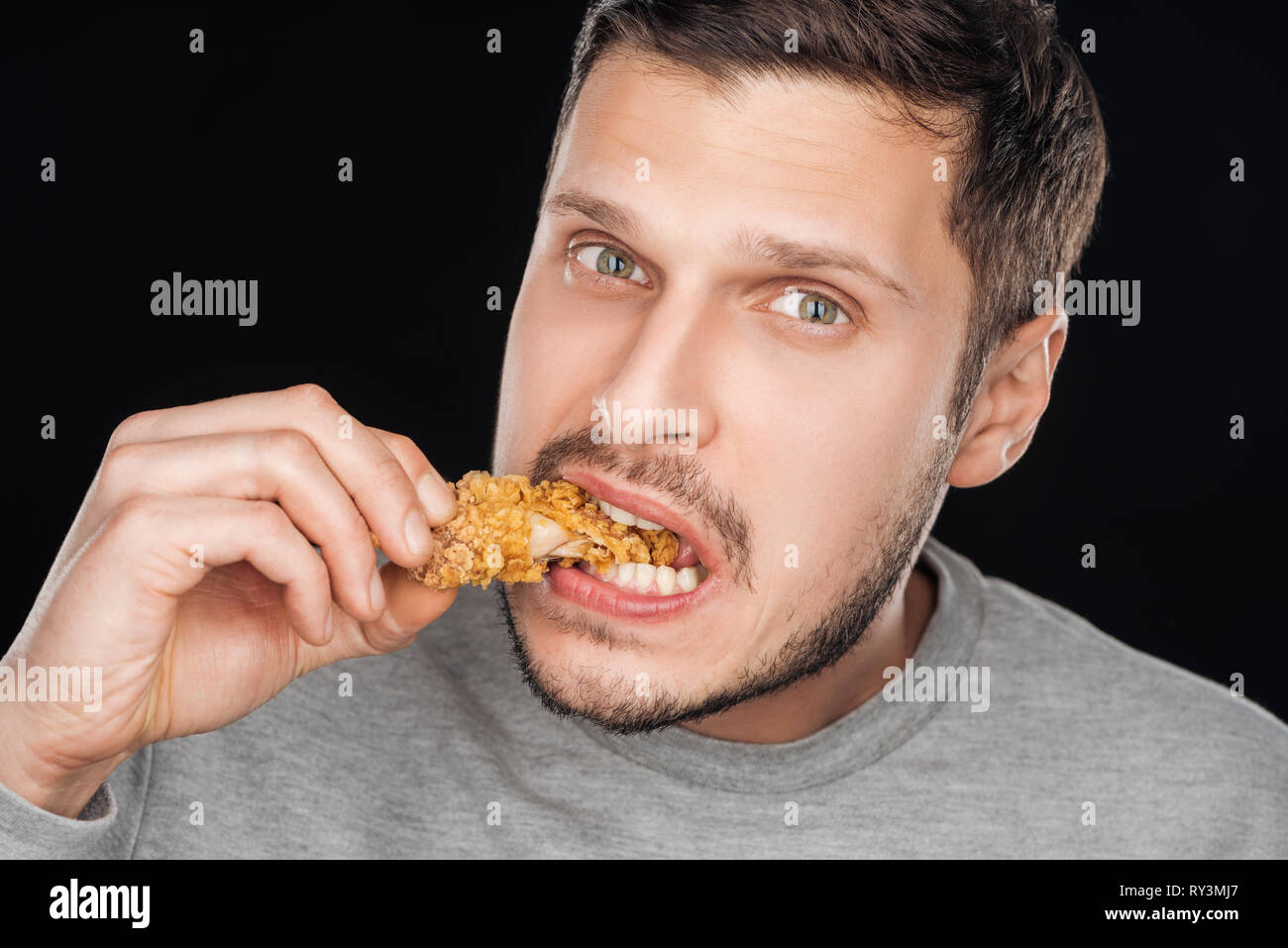 Man eating chicken hi-res stock photography and images - Alamy
