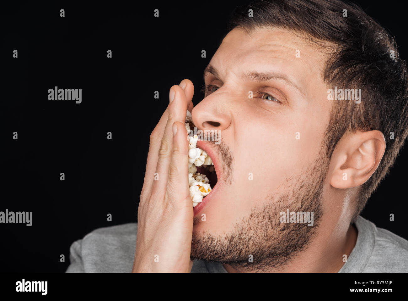 Man eating snack salty hi-res stock photography and images - Alamy