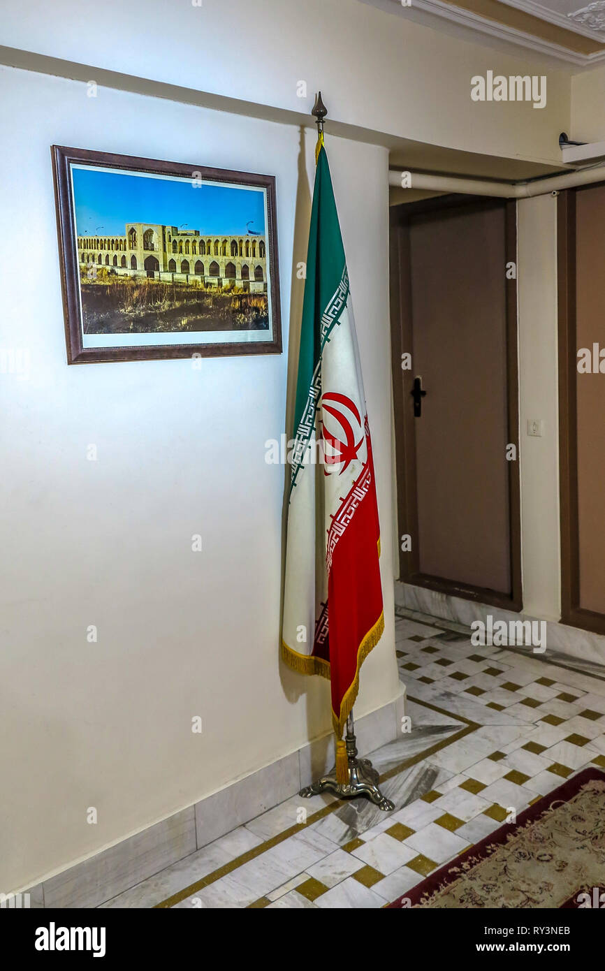 Iranian Flag Standing Still on a Flagpole in a Indoor Corridor with ...