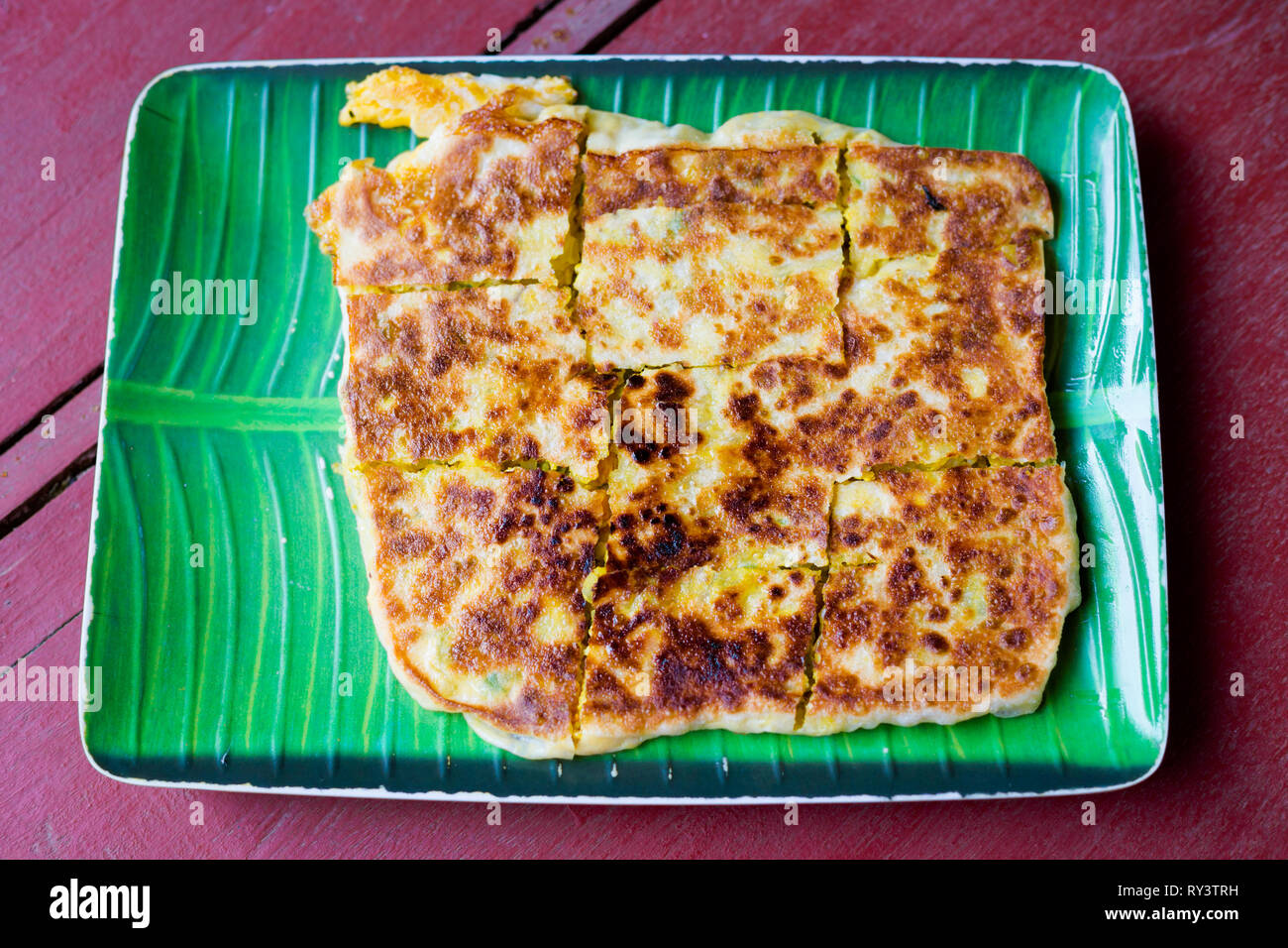 Fresh prepared asian vegetable and egg stuffed Murthaba Roti pancake ...