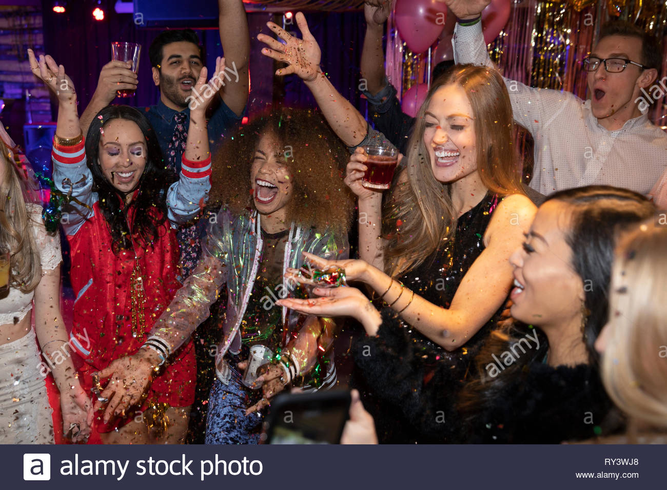 People throwing confetti party hi-res stock photography and images - Alamy