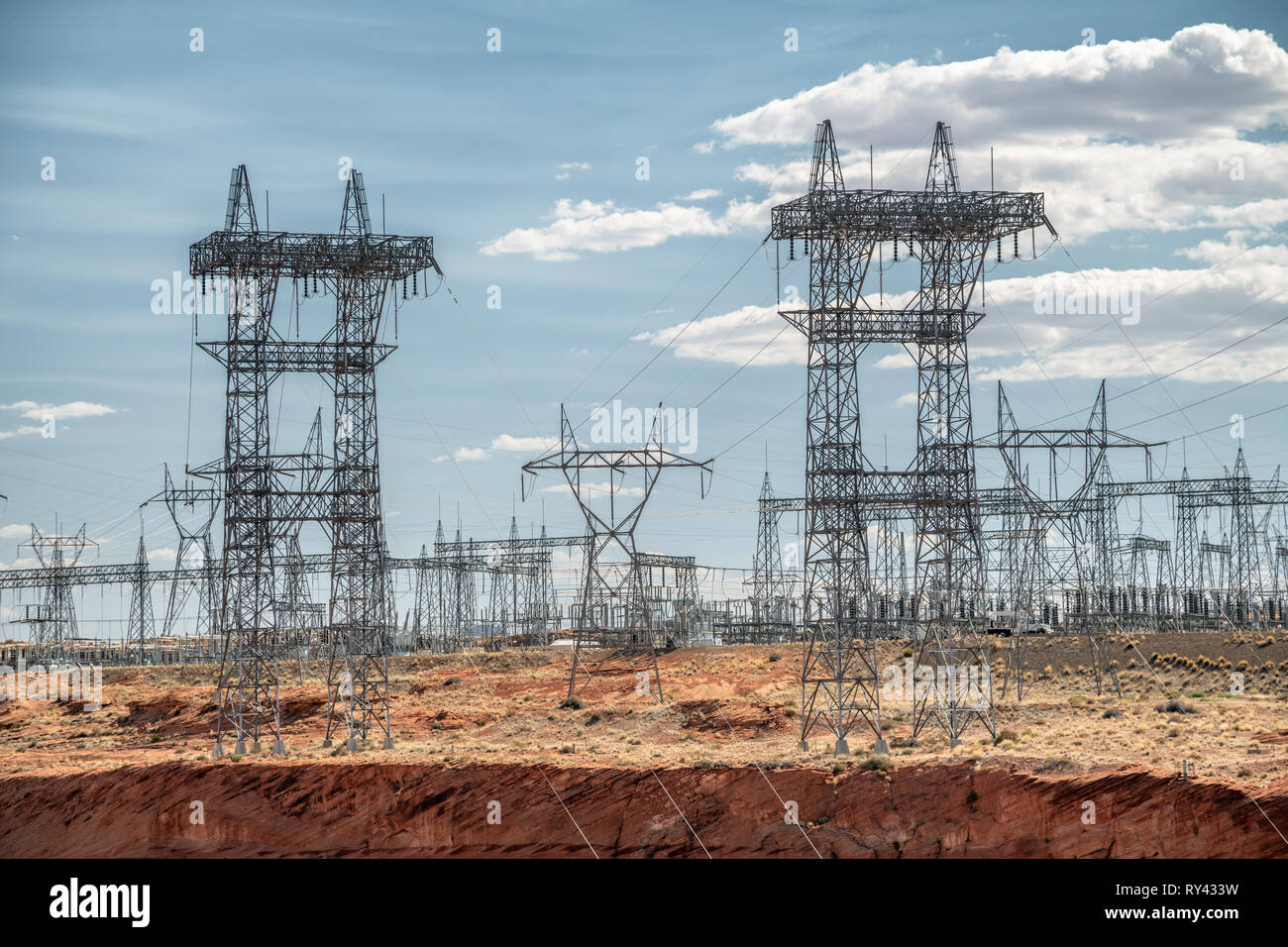 Silhouette of electric pylons with sunny sky before sunset. Energy and ...