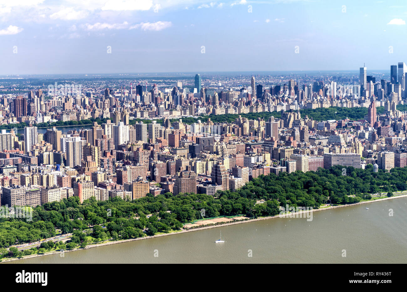Upper Manhattan with Central Park and New York skyline on a sunny day ...