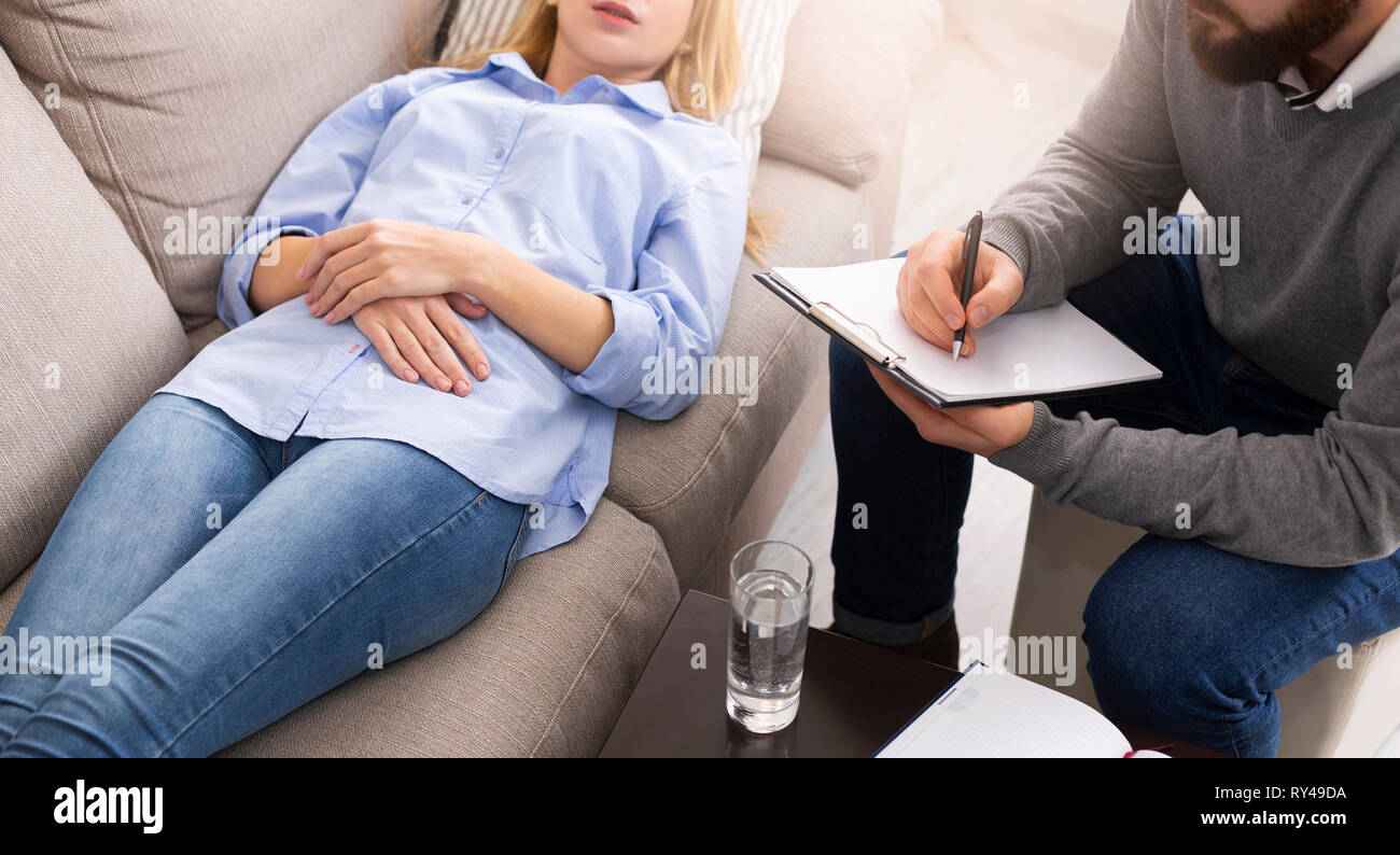 Man lying on sofa therapist hi-res stock photography and images - Alamy