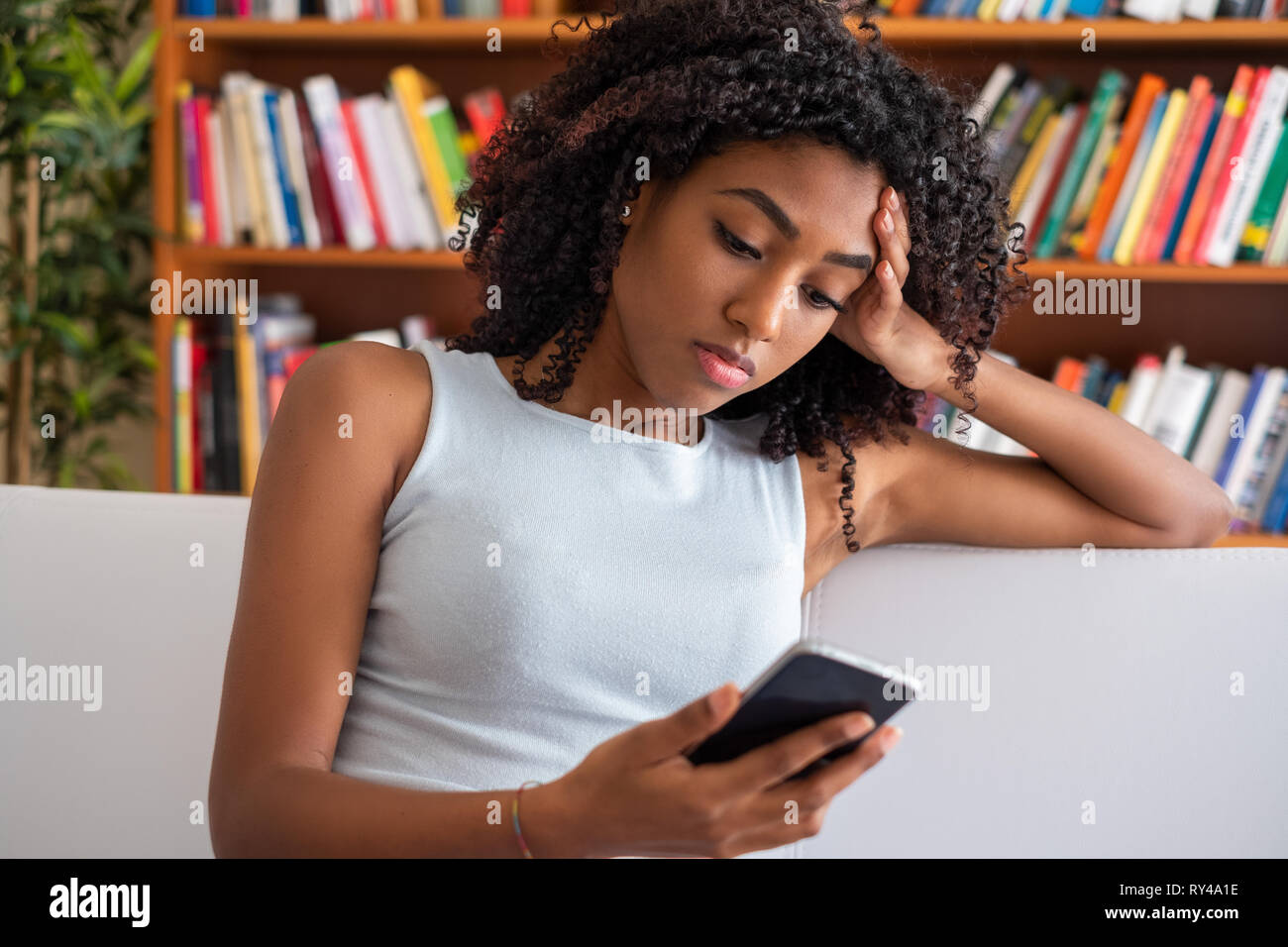 Depressed teenager female phone hi-res stock photography and images - Alamy