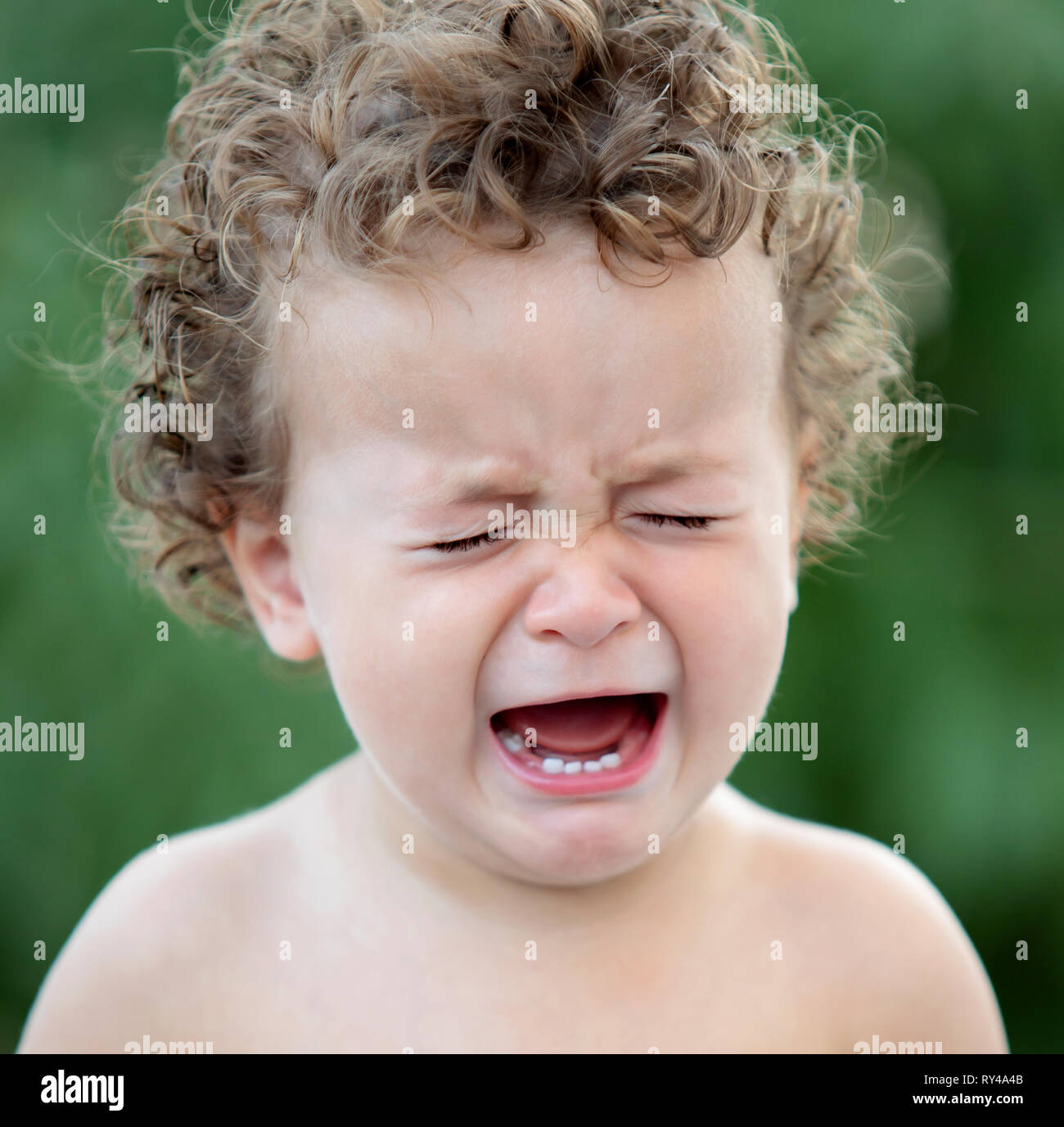 Curly boy sad child hi-res stock photography and images - Alamy
