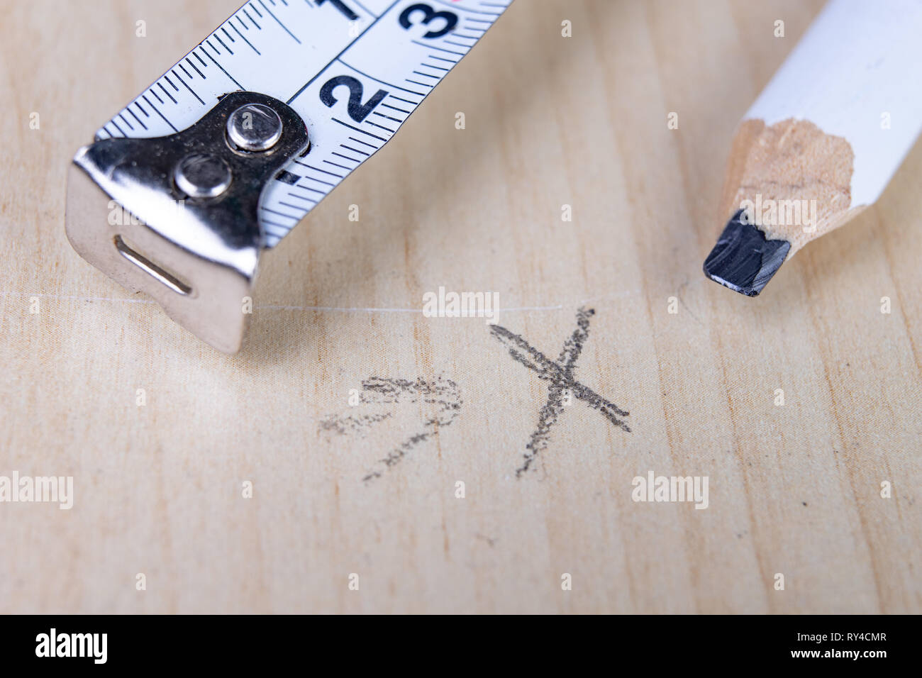 Steel measure and pencil used for measuring in carpentry. Diy ...