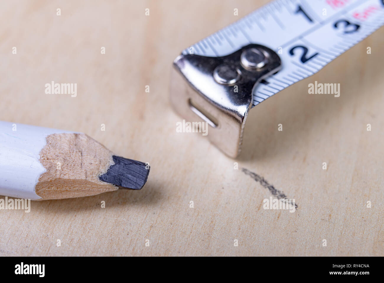 Steel measure and pencil used for measuring in carpentry. Diy ...