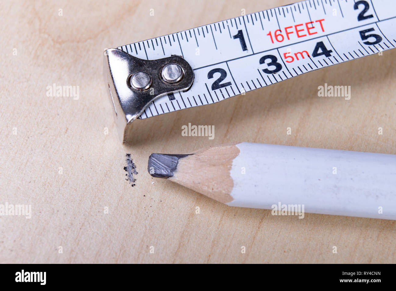 Steel measure and pencil used for measuring in carpentry. Diy ...